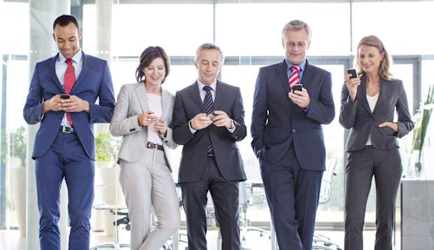 Is Texting Okay At Work? - AOL