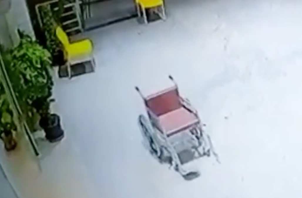 Ghost wheelchair: Security footage shows chair rolling itself around ...