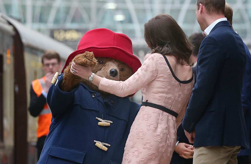 Duchess Kate sports new haircut while dancing with Paddington Bear - AOL
