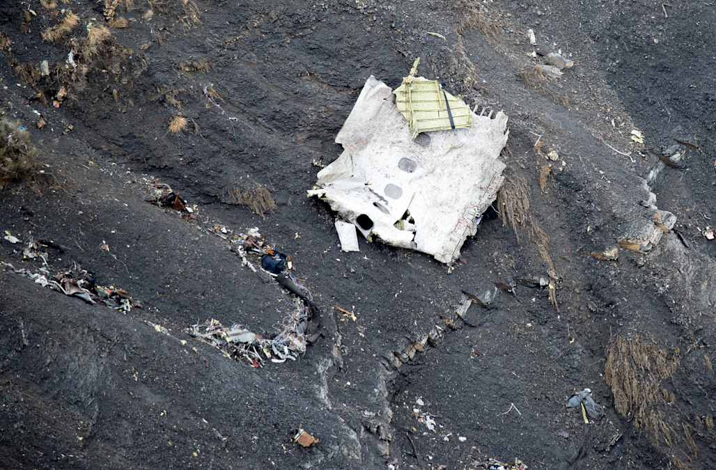 The Latest: Report says 1 pilot locked out before crash