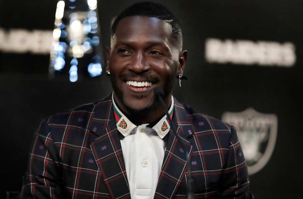 Antonio Brown ditches blond mustache, flanked by Super Bowl trophies in ...