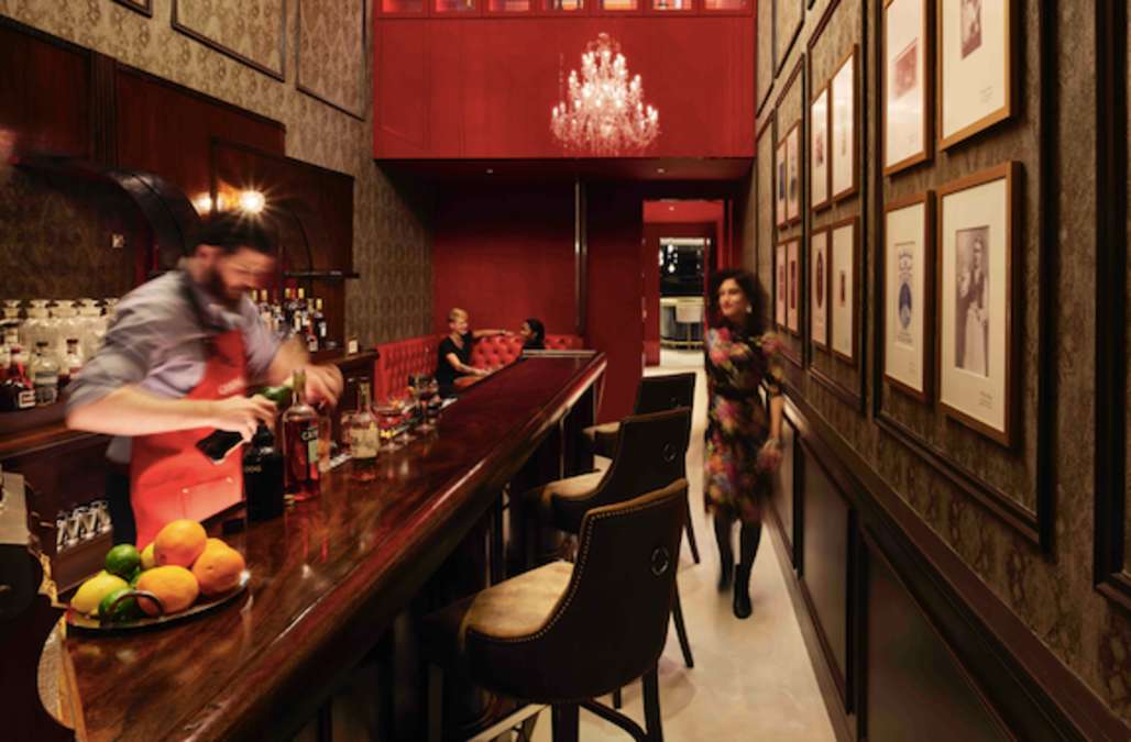 You'll have to walk through a bottle of Campari to find this hidden bar ...
