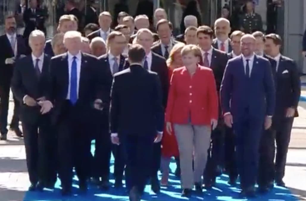 Emmanuel Macron appears to swerve Trump's handshake at NATO to hug ...