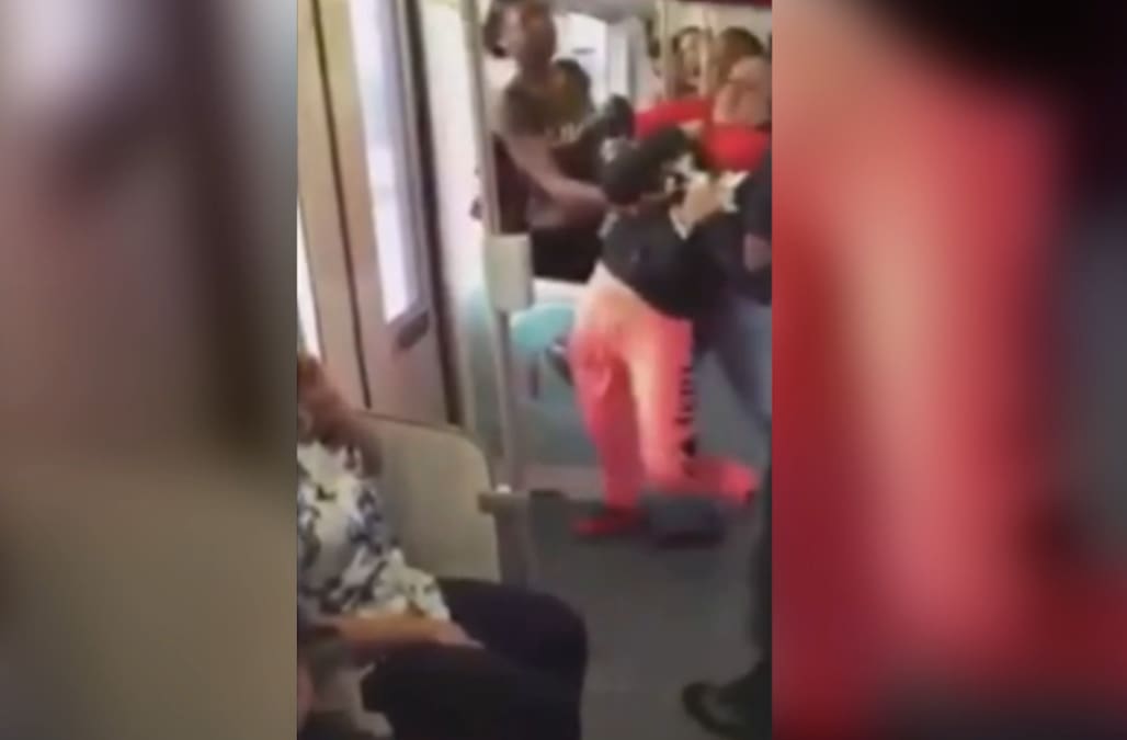 Video reveals woman being beaten on train...while bystanders do nothing ...