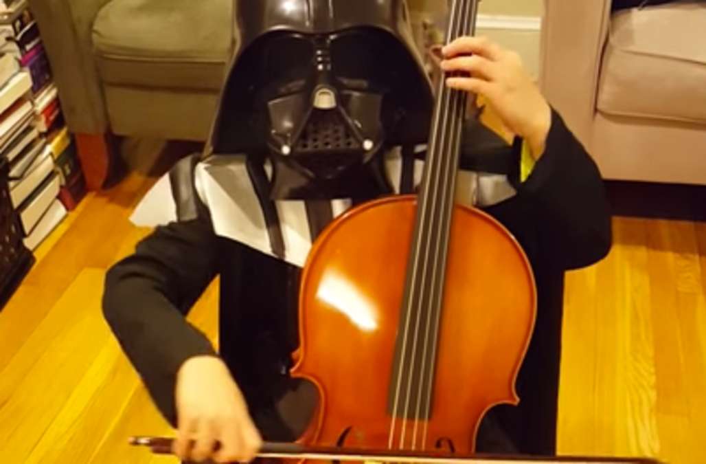 Watch this tiny Darth Vader play 'Star Wars' on a cello - AOL