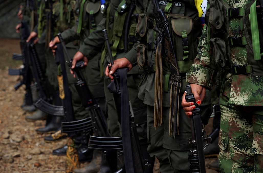 Colombia's FARC rebels give up guns in disarmament camps