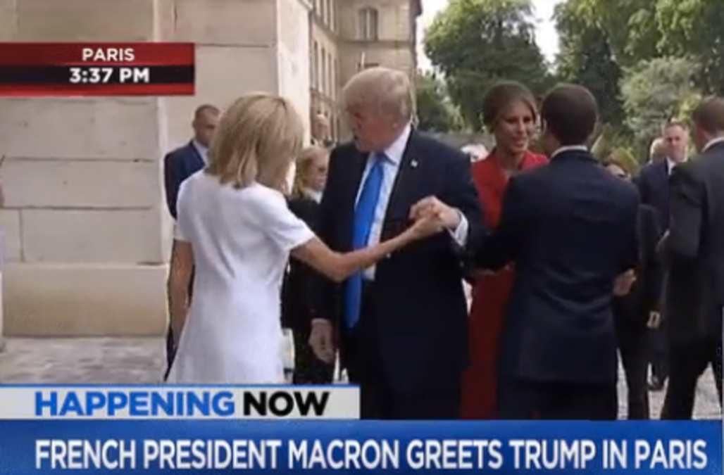 President Trump does the 'yank-and-pull' handshake with France's first ...
