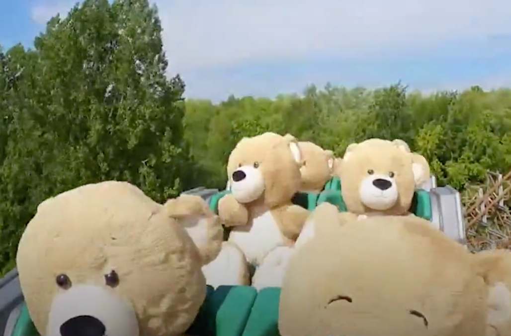 Teddy bears have an absolute blast riding a roller coaster