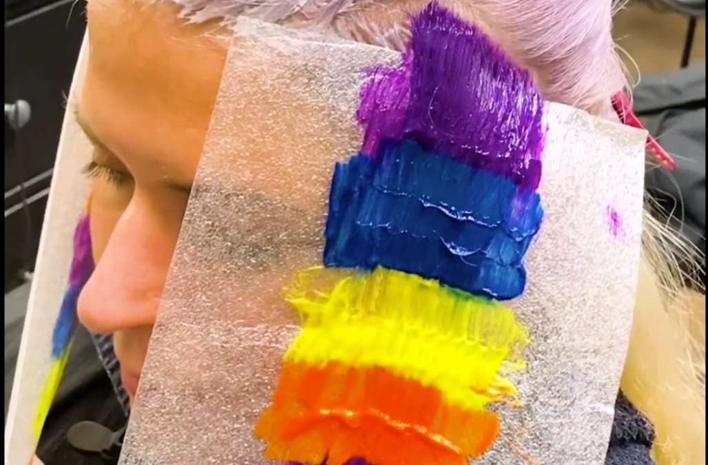 Hairstylist specializes in unique rainbow highlights